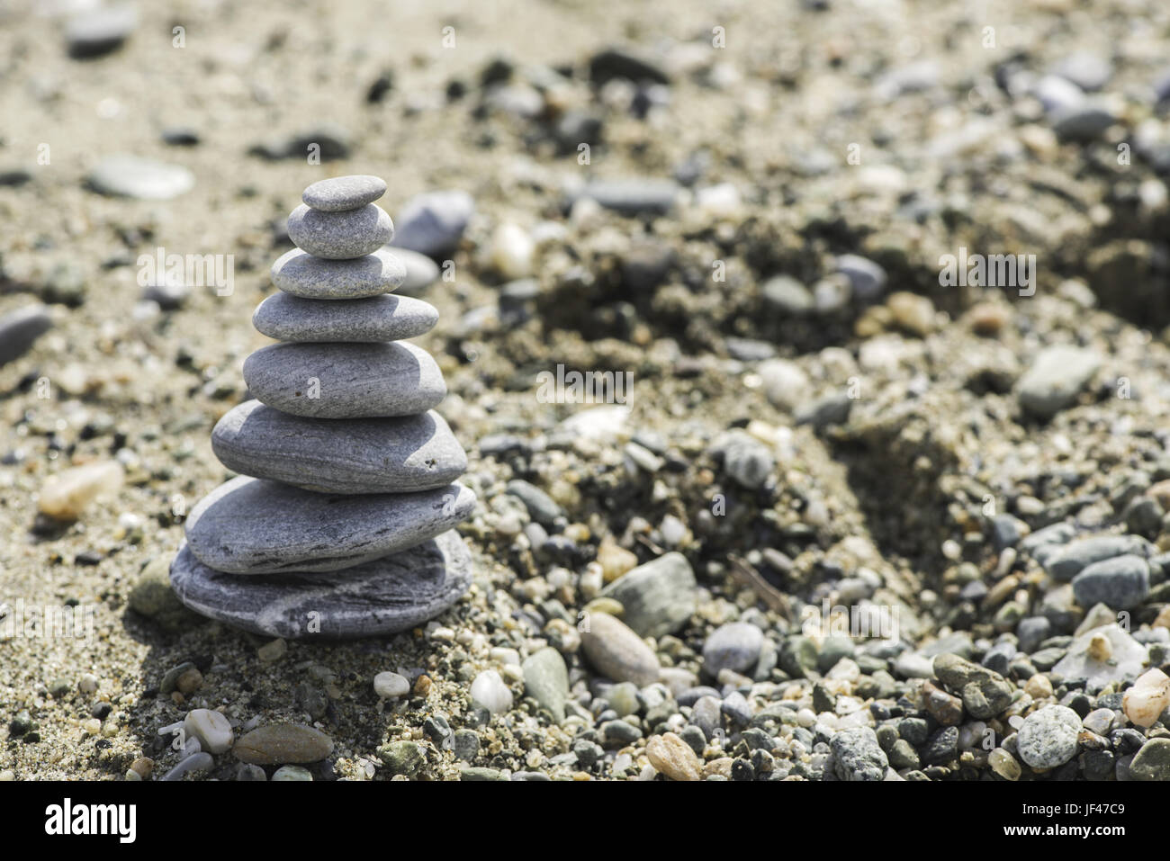 Stacked sea stones Stock Photo - Alamy