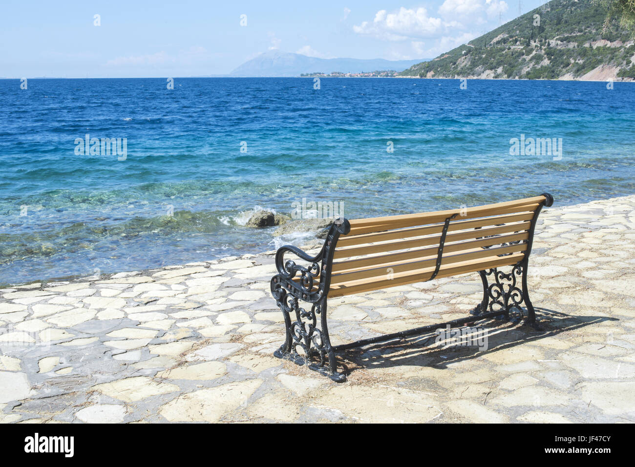 Bench on the beach Stock Photo - Alamy