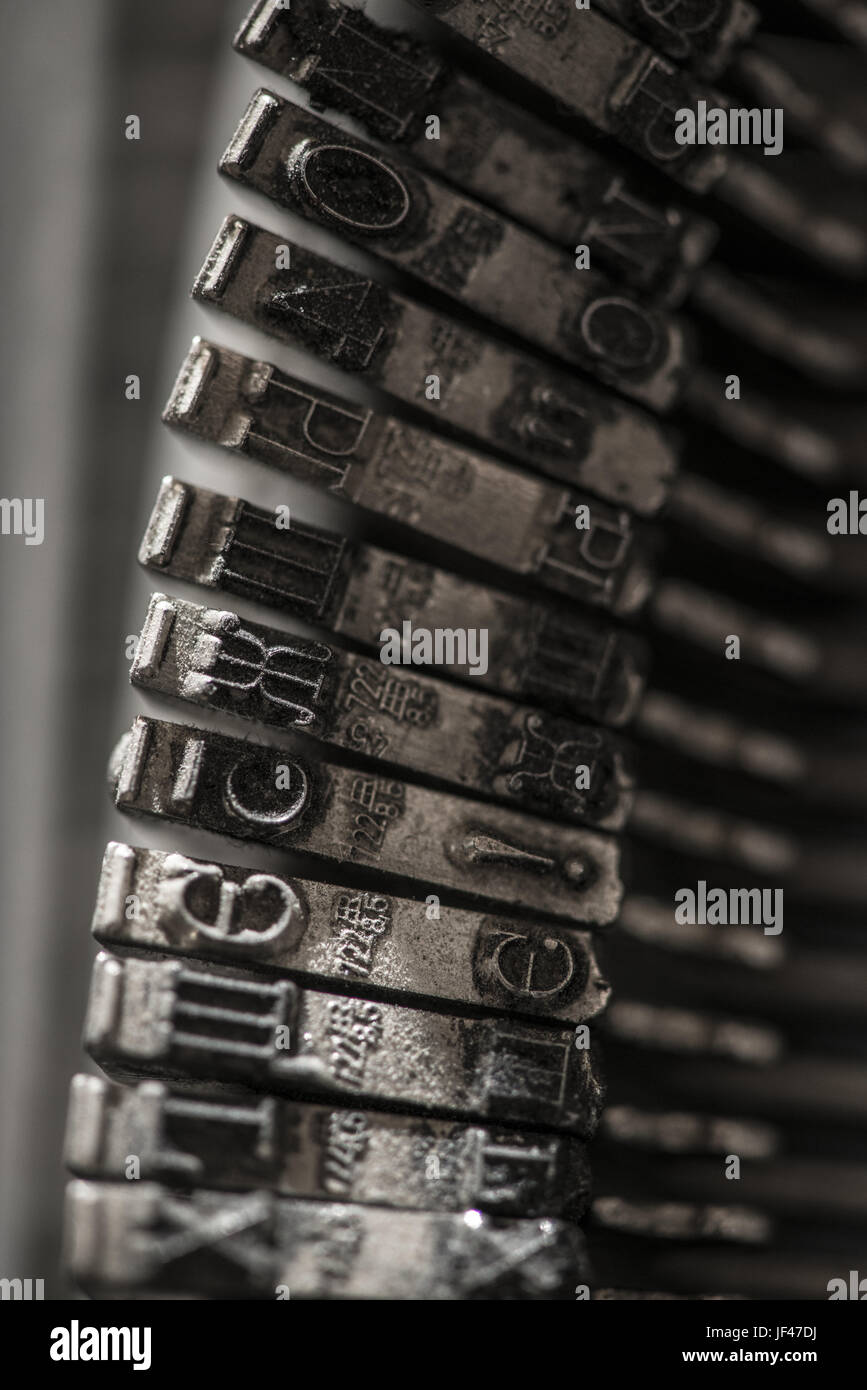 Metal letters on typewriter Stock Photo - Alamy
