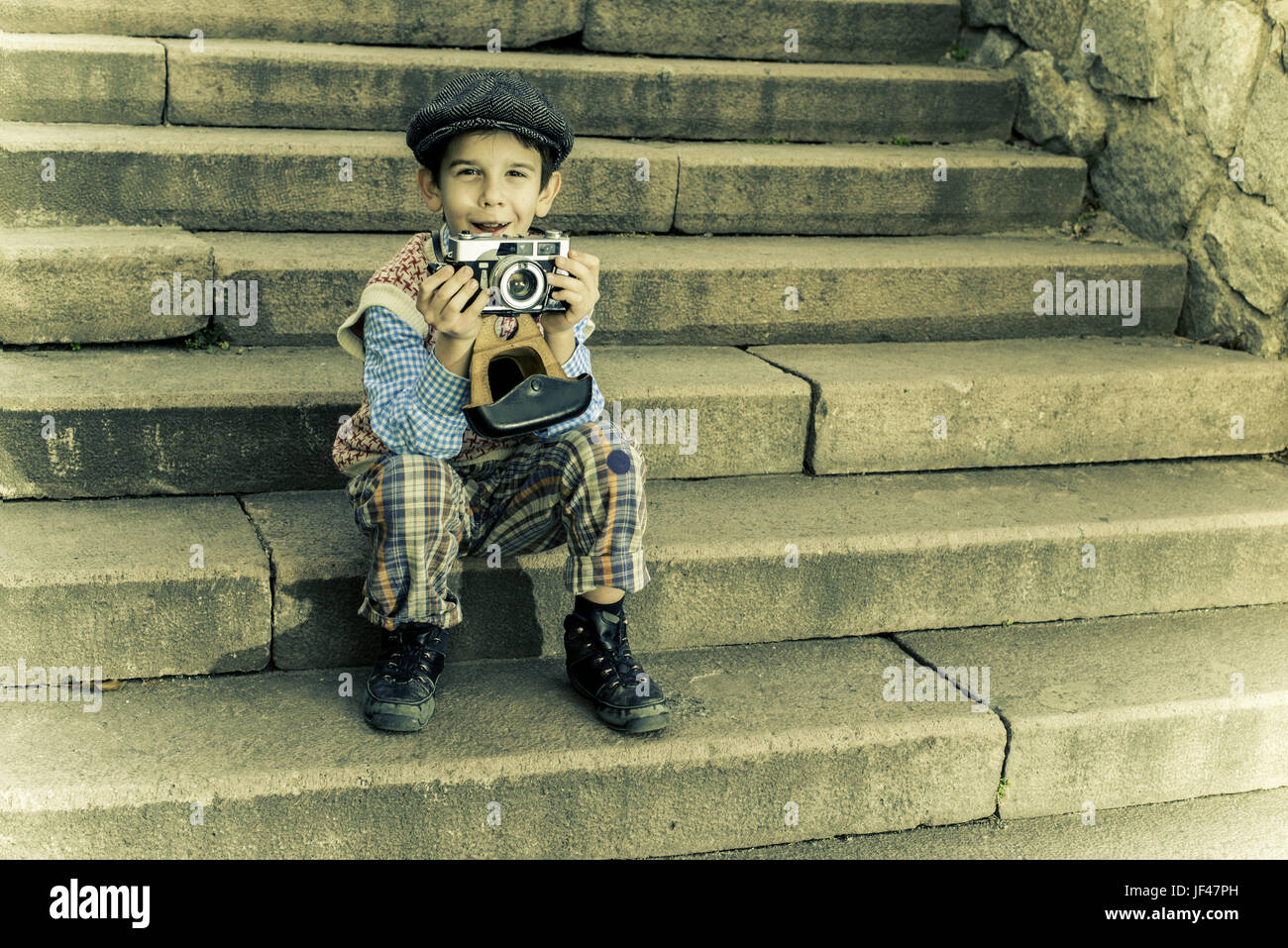 Child with vintage camera Stock Photo - Alamy