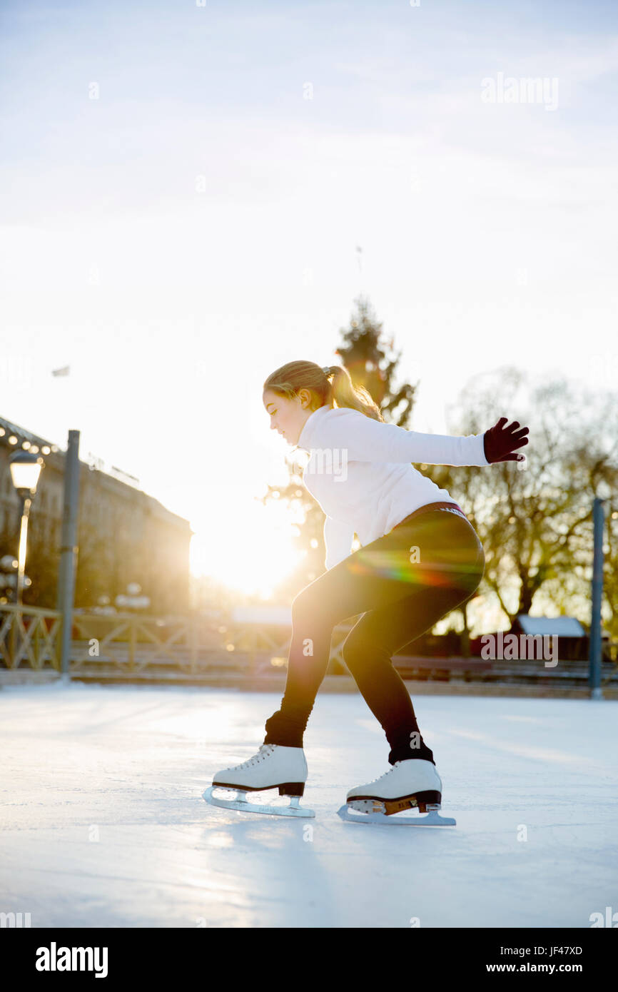 Woman figure skating Stock Photo - Alamy