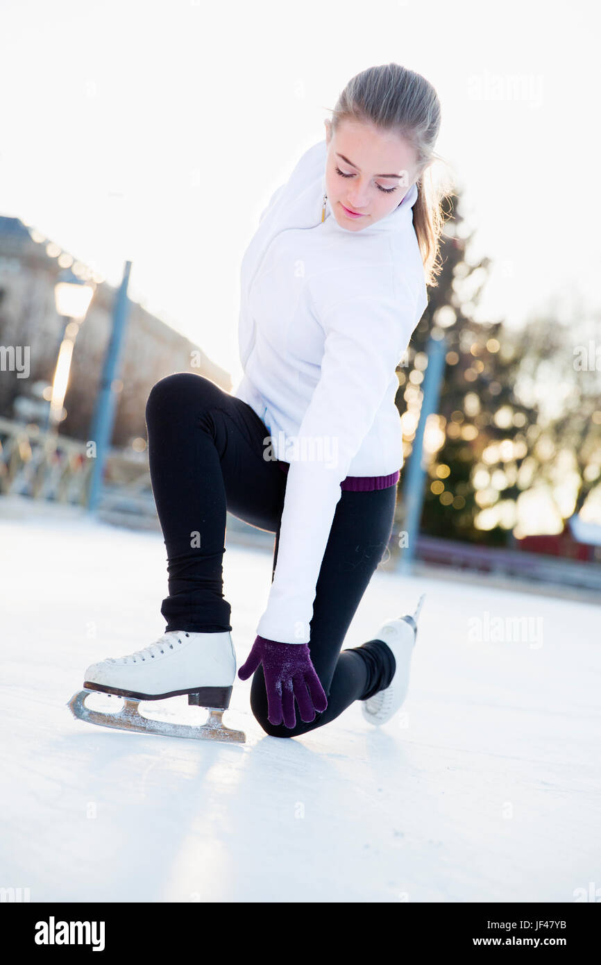 Woman figure skating Stock Photo - Alamy