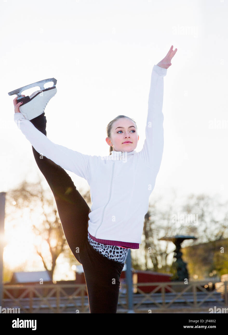 Woman figure skating Stock Photo - Alamy