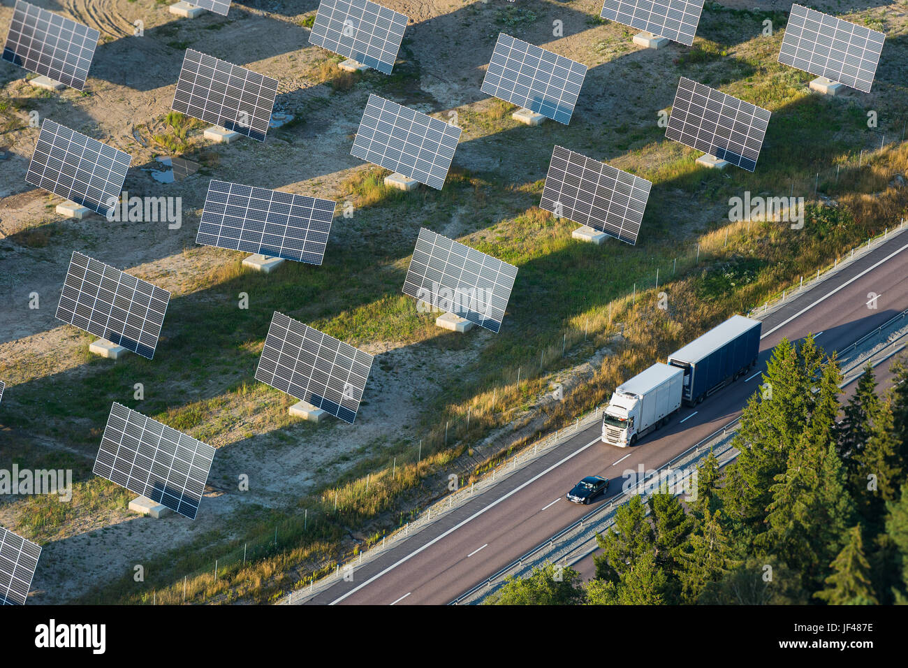 Solar farm near road Stock Photo - Alamy