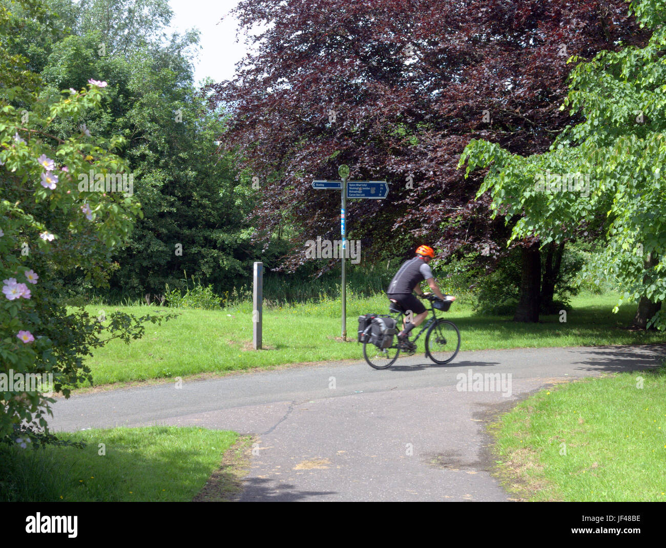 Forth and Clyde canal Glasgow Scotland cyclist on bike on the tow path ...
