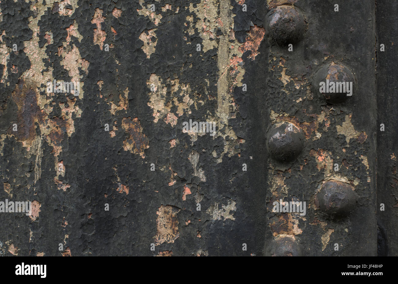 Metal wall with rivets Stock Photo - Alamy