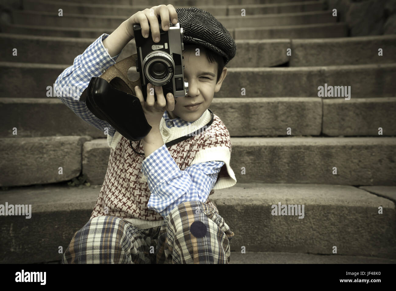 Child with vintage camera Stock Photo - Alamy
