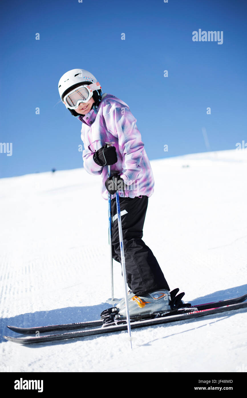 Girl on ski slope Stock Photo - Alamy