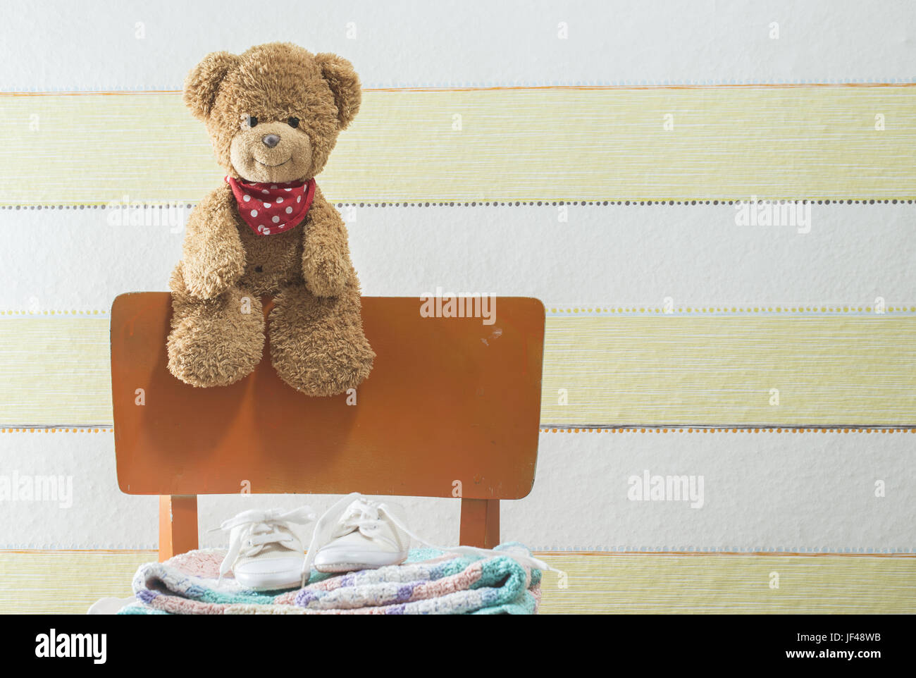 Teddy bear in a baby room Stock Photo - Alamy