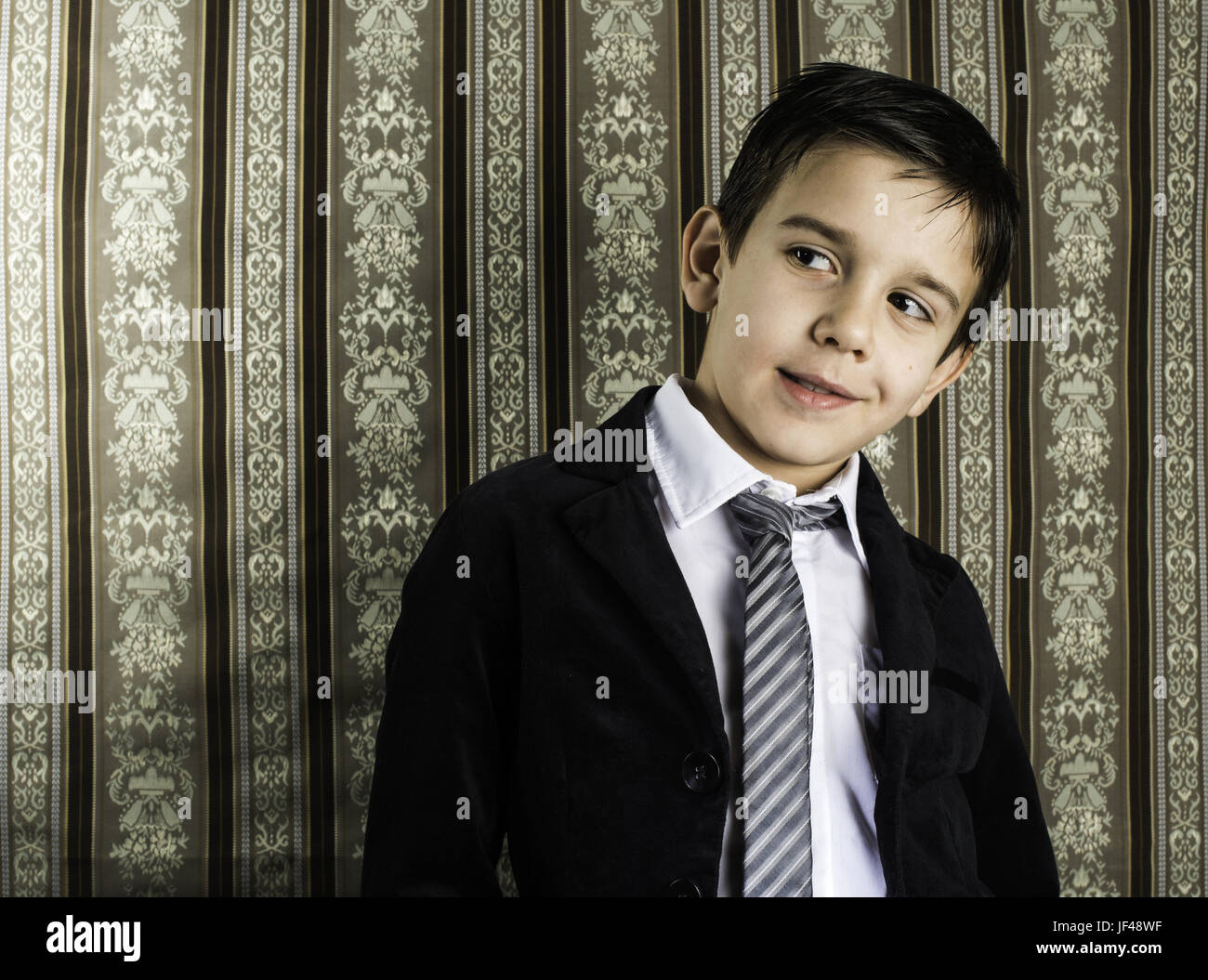 Boy in vintage suit Stock Photo - Alamy