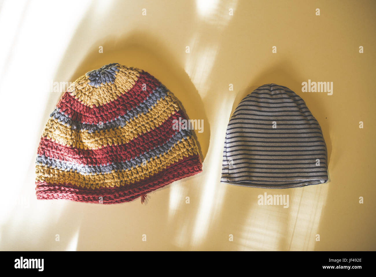 Big and small hats Stock Photo - Alamy