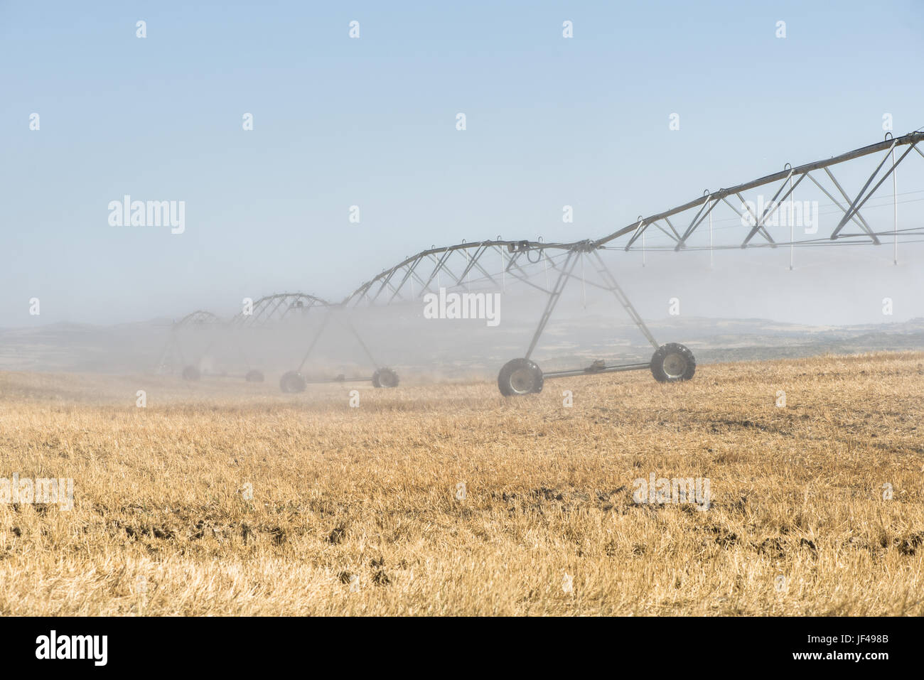 Irrigation sprayers in the field Stock Photo - Alamy