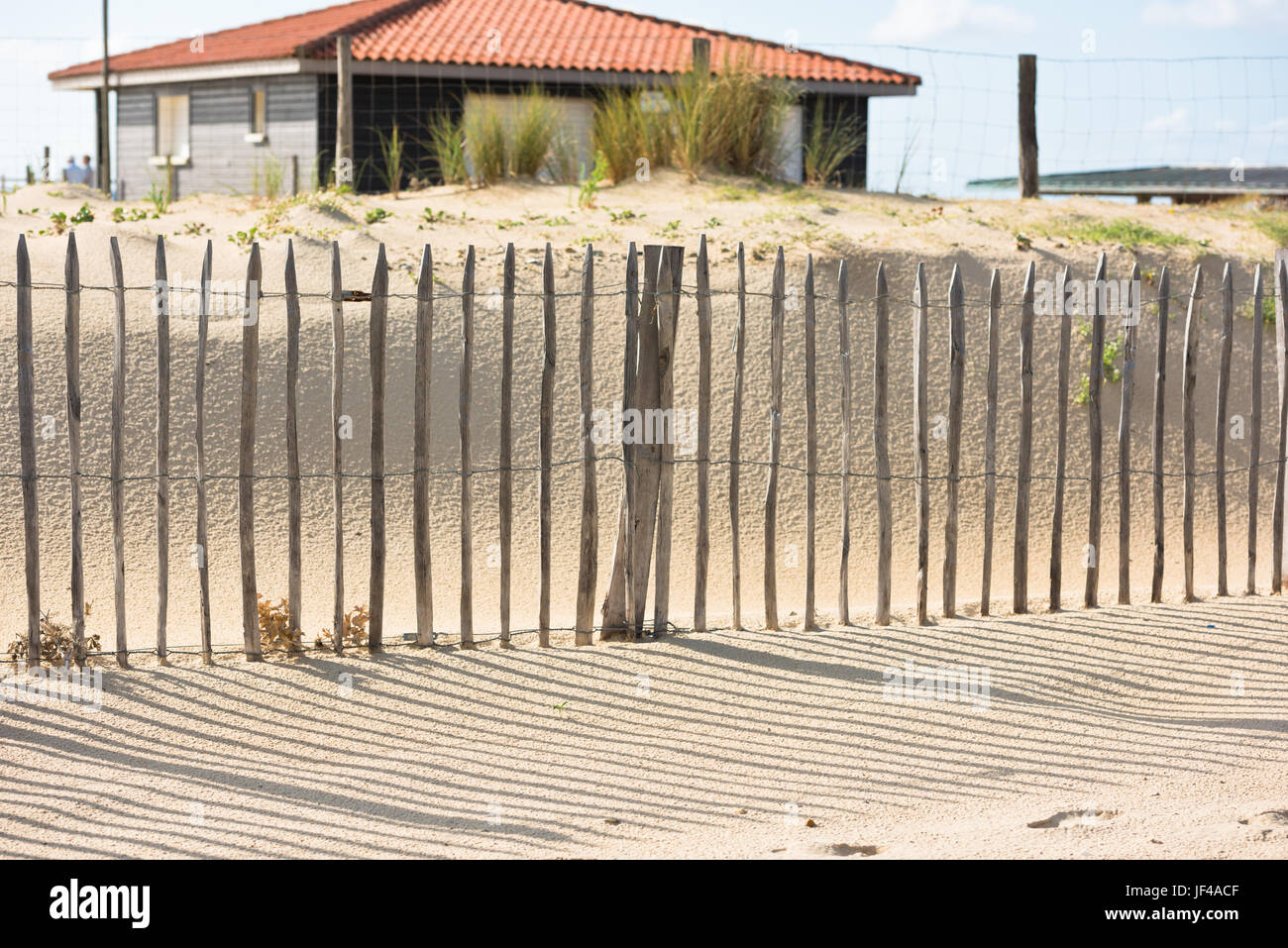 Wooden fence on an Atlantic beach in France, The Gironde Department ...
