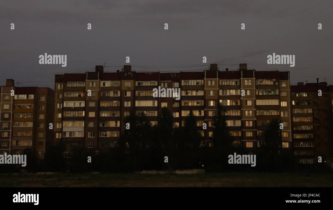 yellow high-rise buildings during the early dawn Stock Photo - Alamy
