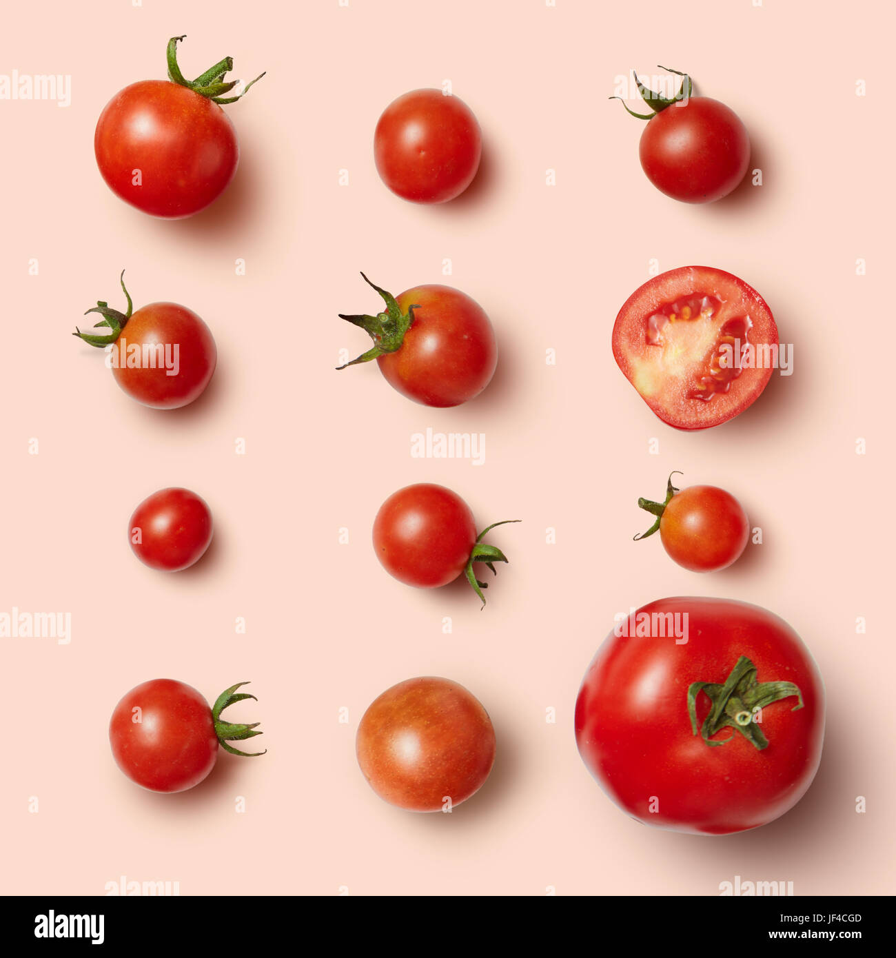 cherry tomatoes isolated Stock Photo - Alamy