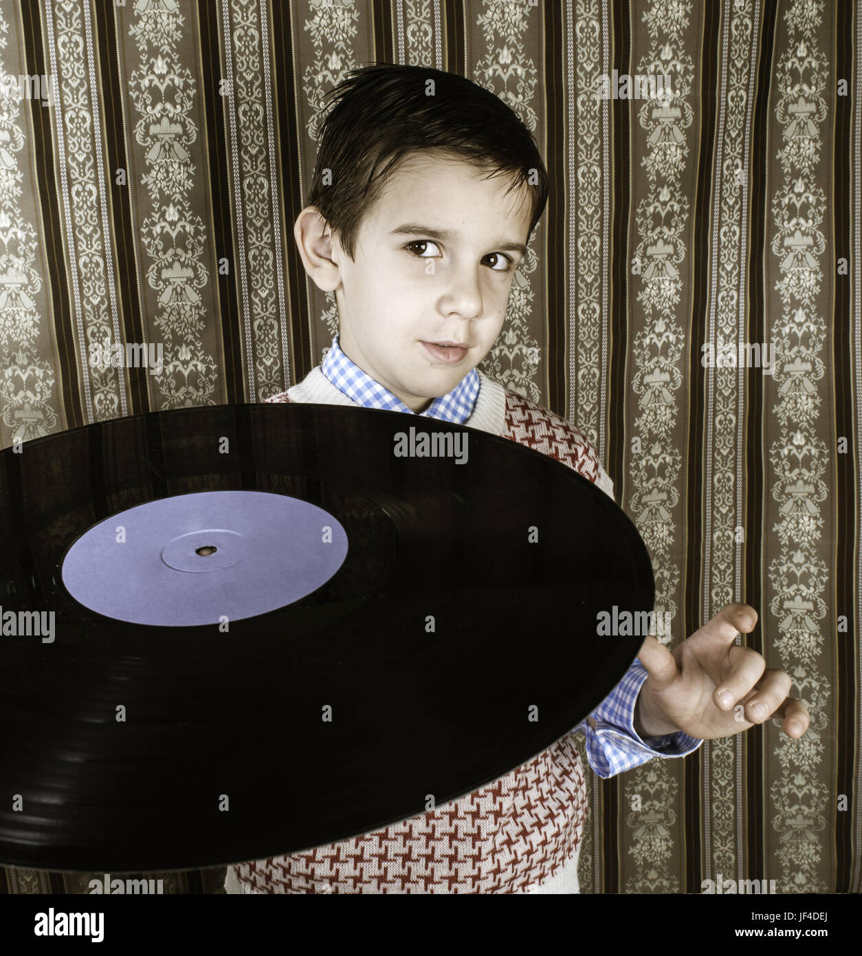 Child hold lp Stock Photo - Alamy