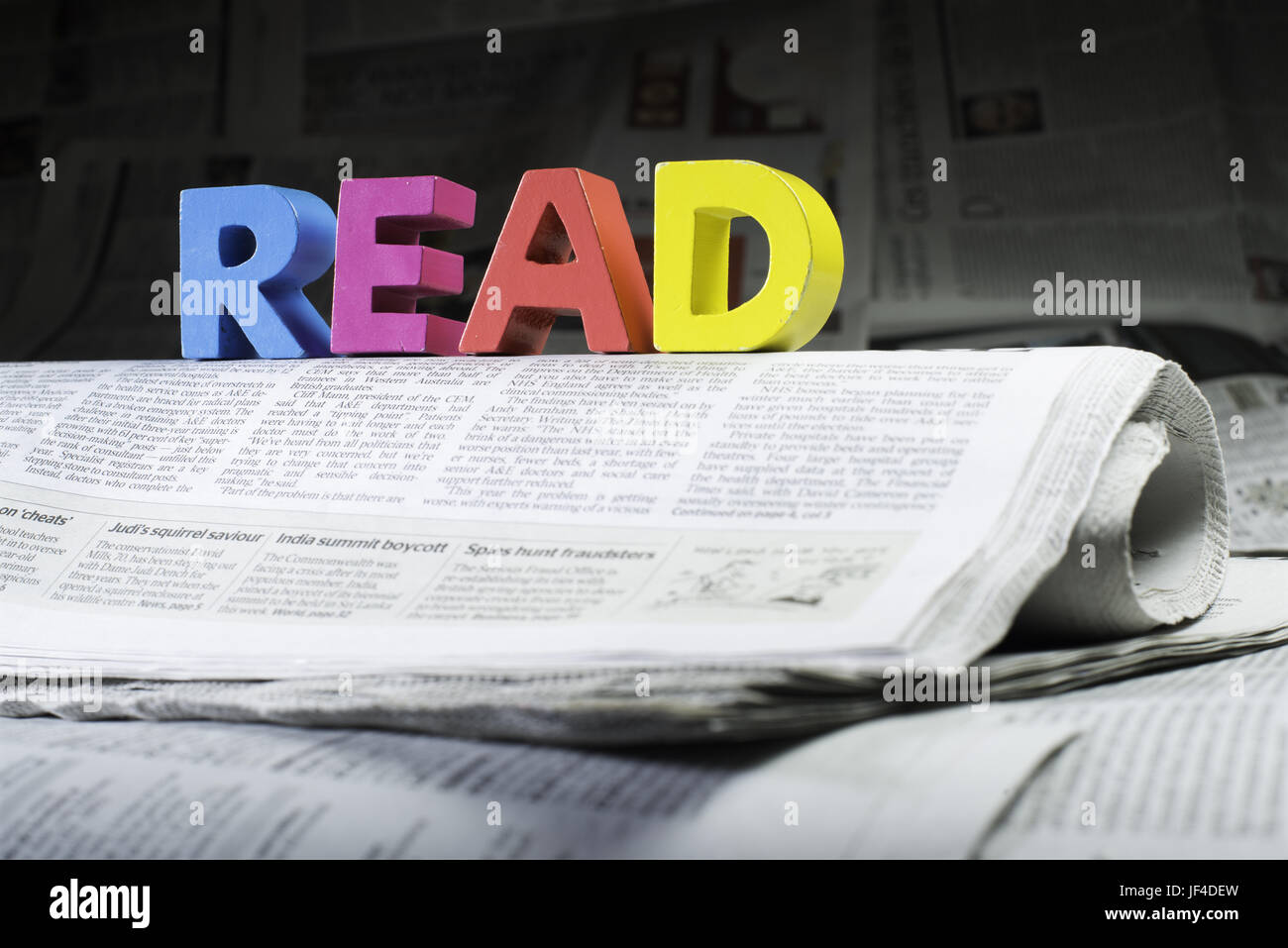 Word read on newspaper Stock Photo - Alamy