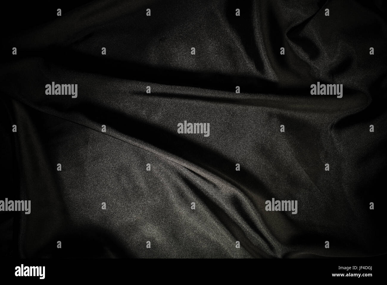 Shiny black satin fabric Stock Photo - Alamy