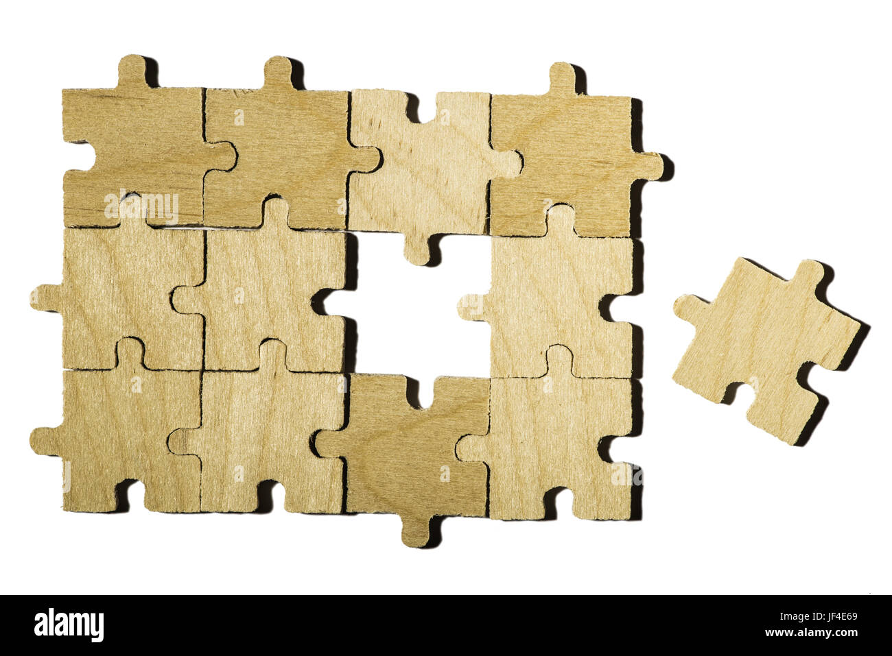 Wooden puzzle on white background Stock Photo - Alamy