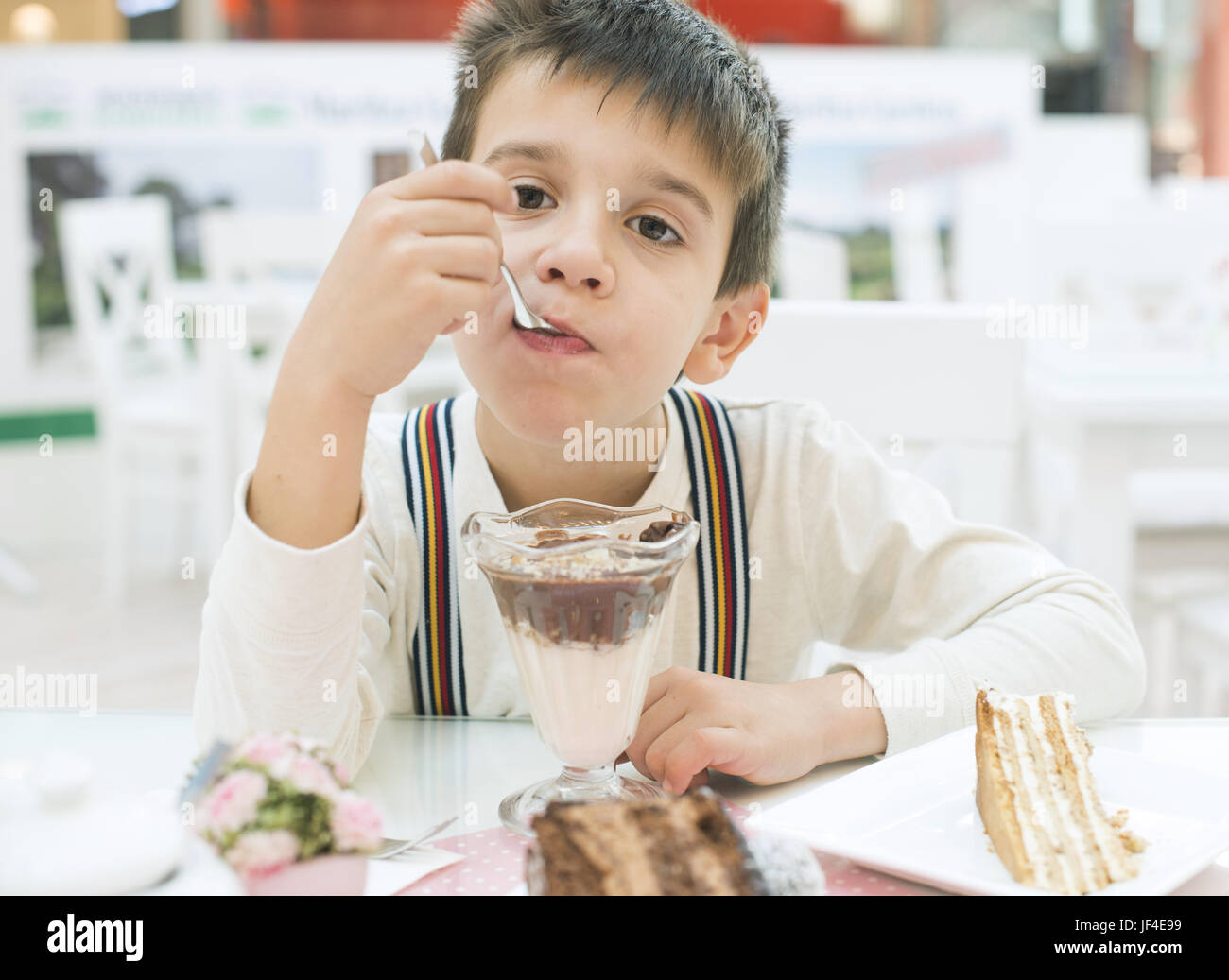 Child eat milk choco shake Stock Photo - Alamy