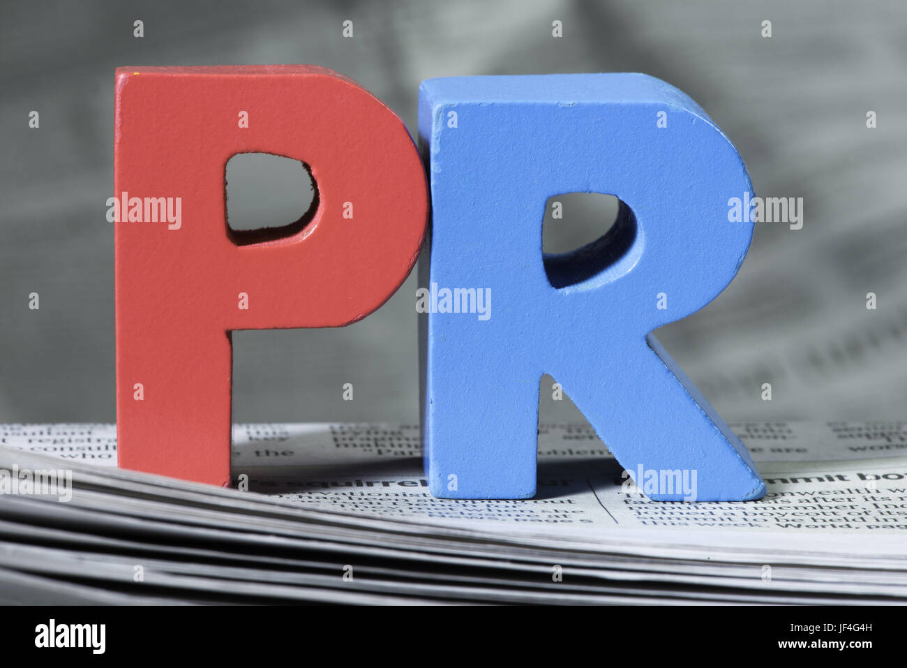 Word PR on newspaper Stock Photo - Alamy