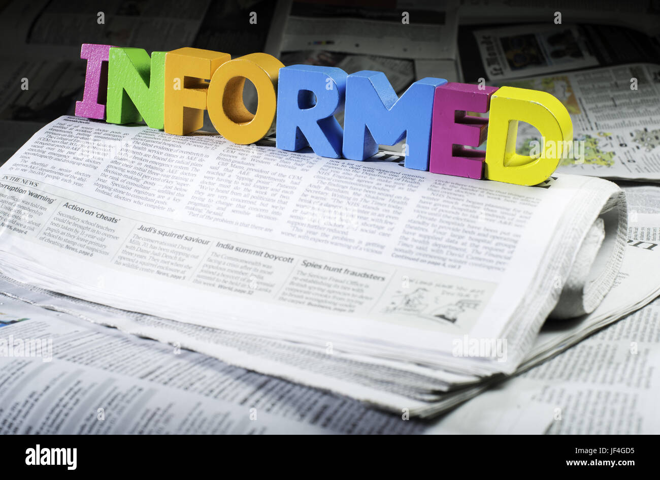 Word informed on newspaper Stock Photo - Alamy