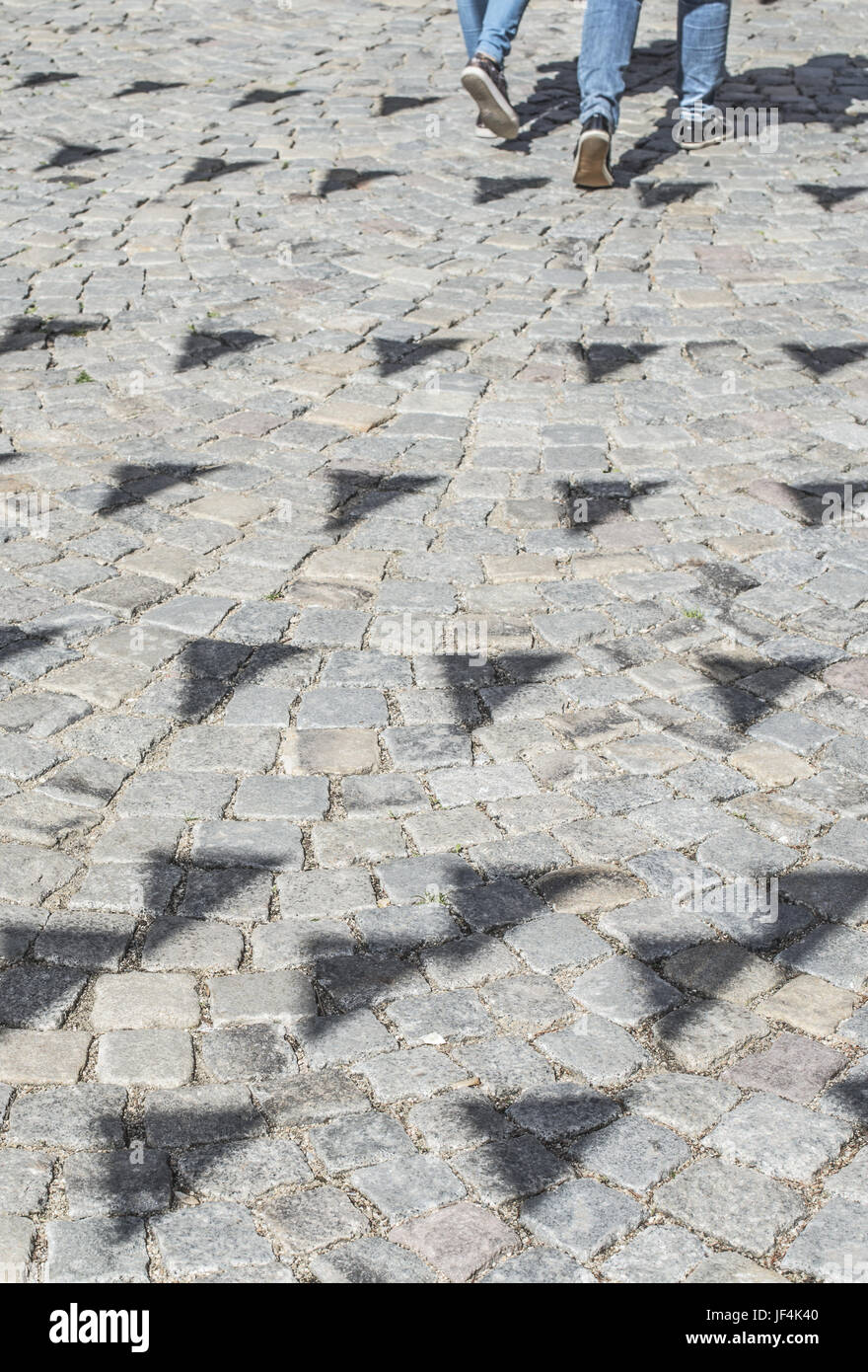 Shadows of festival flags Stock Photo - Alamy