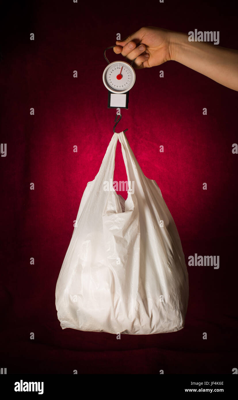 Weigh scales and bag Stock Photo - Alamy