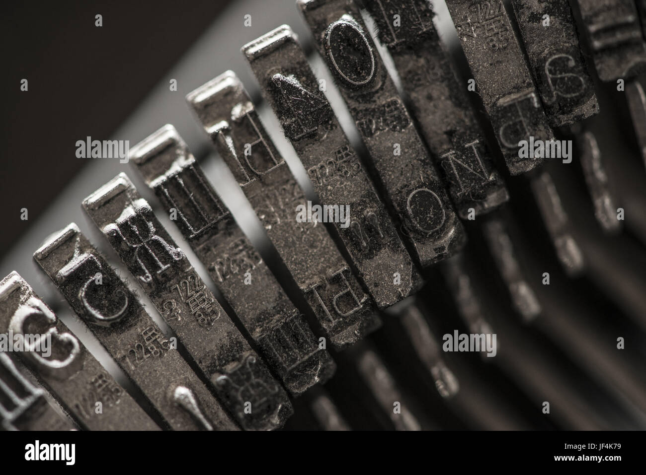Metal letters on typewriter Stock Photo - Alamy
