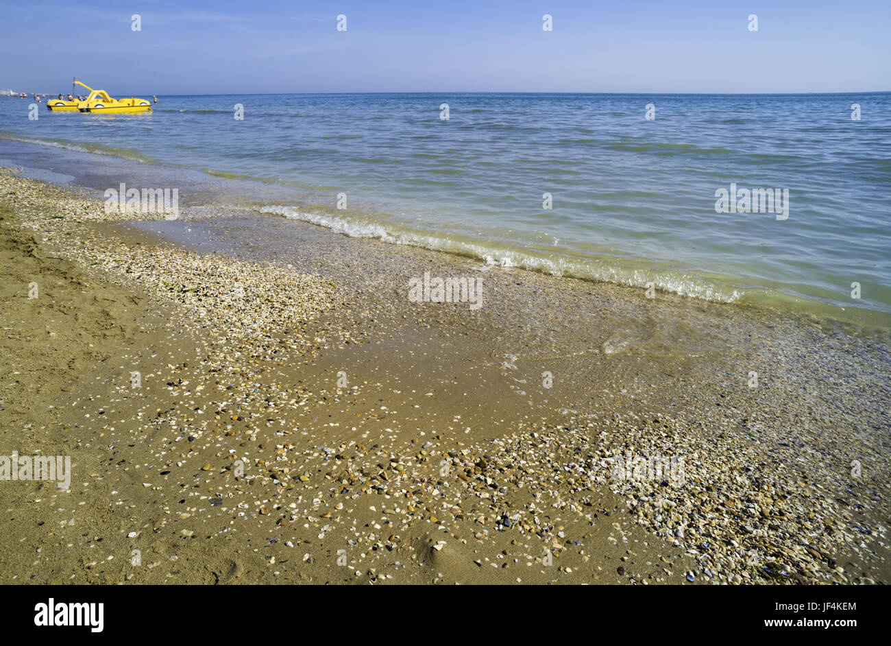 Yellow lifeboat on the beach Stock Photo - Alamy