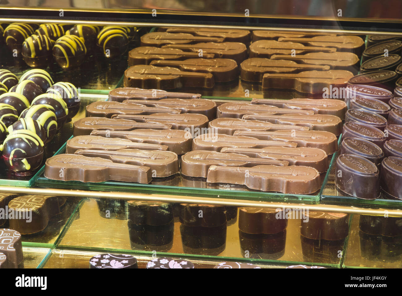 Chocolate candy in a store window Stock Photo - Alamy