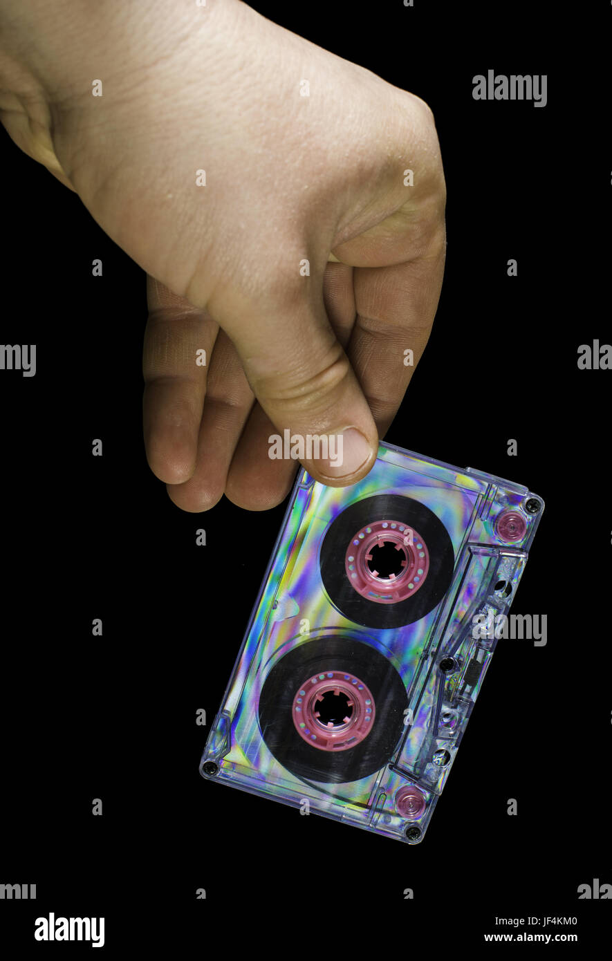 Hand holding vintage cassette tape Stock Photo - Alamy