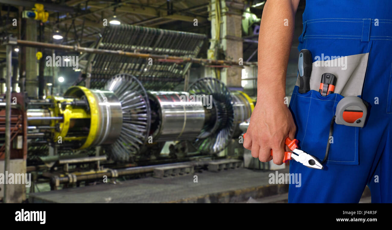 Worker with instruments Stock Photo - Alamy