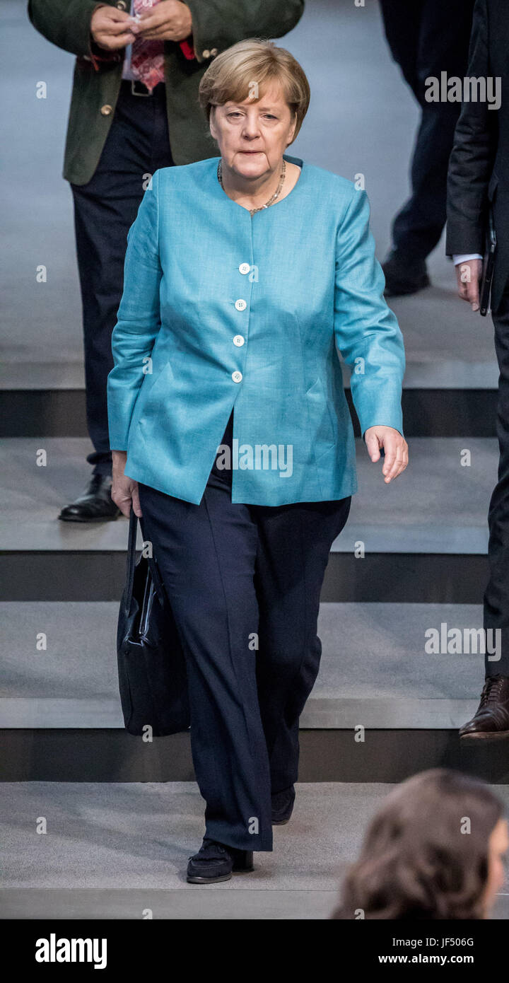 Berlin, Germany. 29th June, 2017. German Chancellor Angela Merkel walks ...