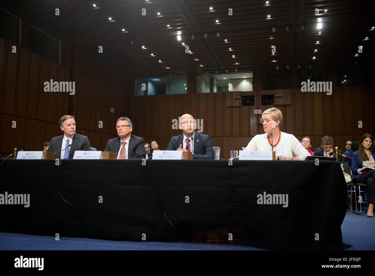 From left to right: Ambassador Nicholas Burns, Roy and Barbara Goodman ...