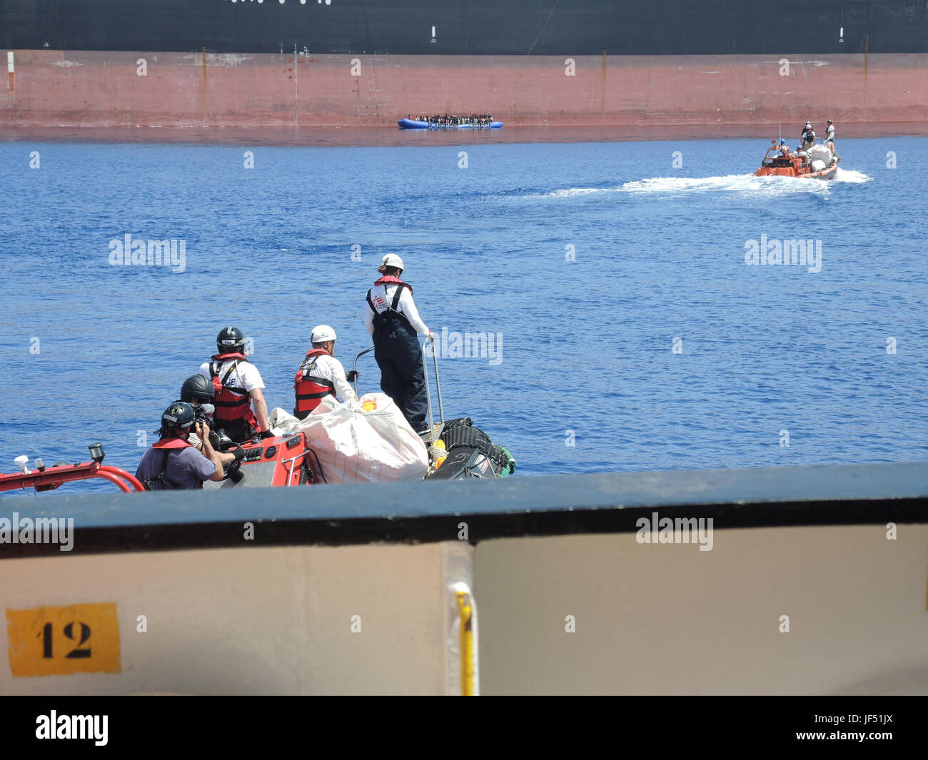 Boats from the "Aquarius" rescue ship sail in the Mediterranean towards ...