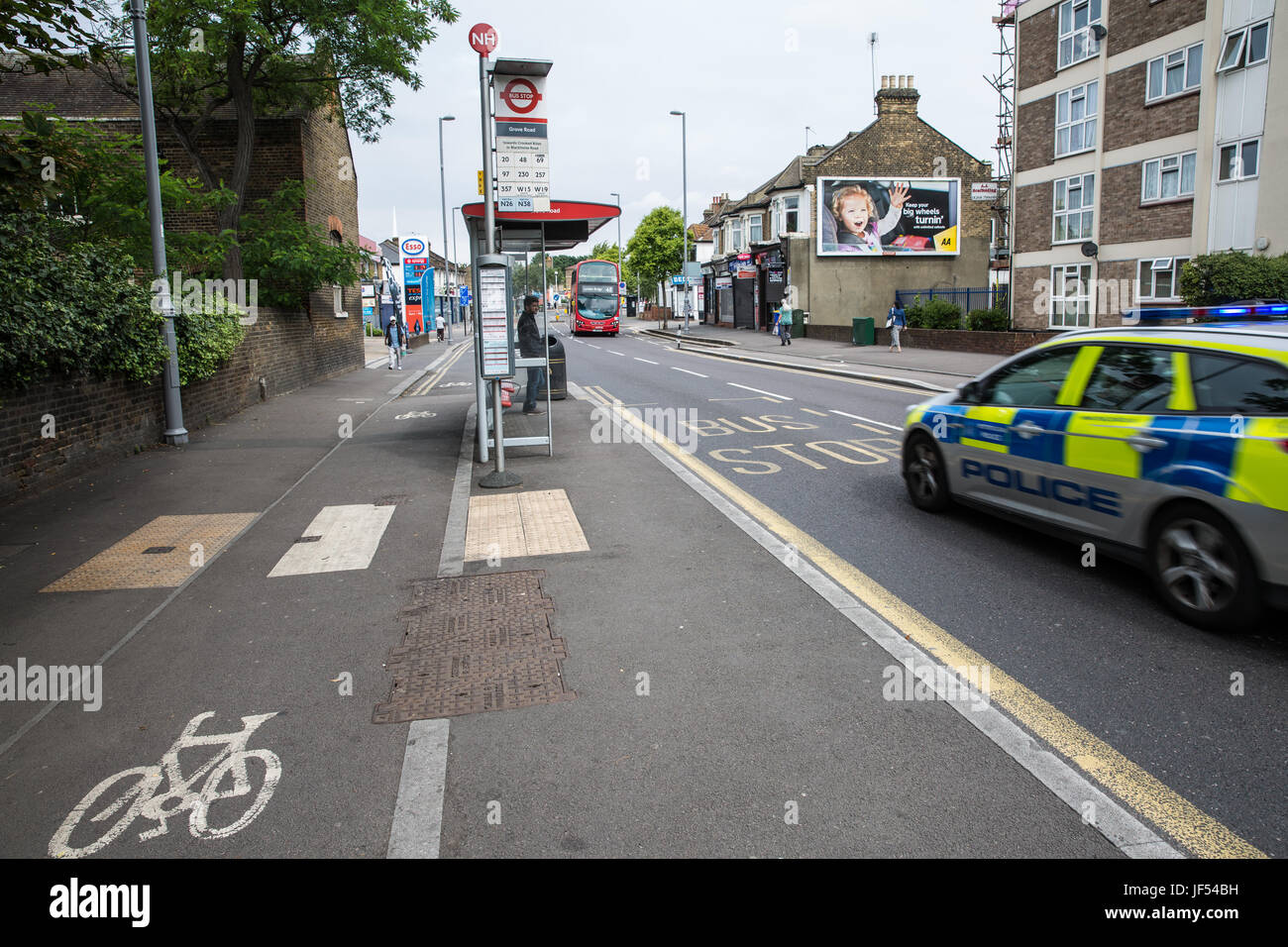 London, UK. 29th June, 2017. An emergency vehicle passes a bus stop ...