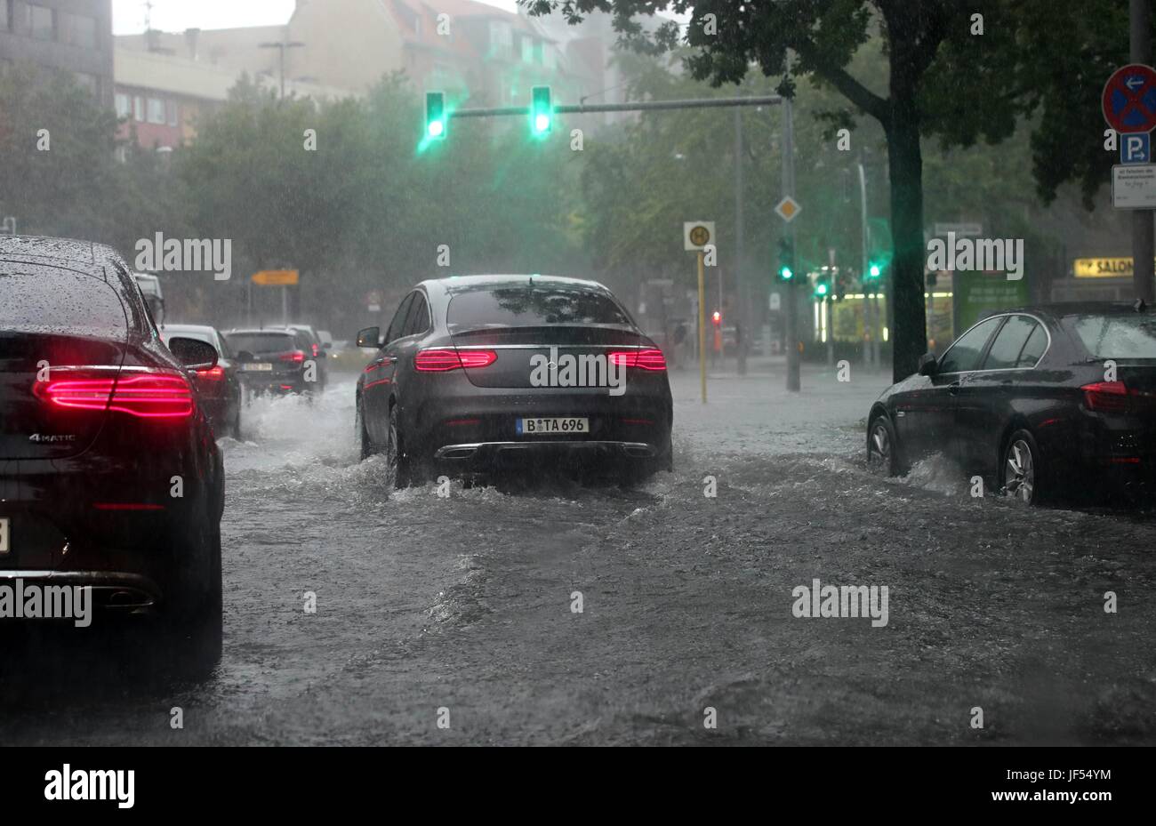 Berlin, Germany. 29th June, 2017. Heavy rainfall floods the streets in ...