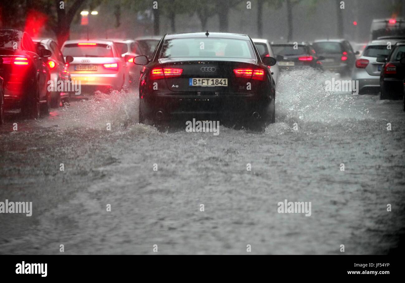 Berlin, Germany. 29th June, 2017. Heavy rainfall floods the streets in ...