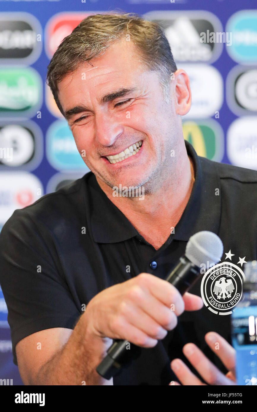 Krakow, Poland. 29th June, 2017. The German headcoach Stefan Kuntz sits ...