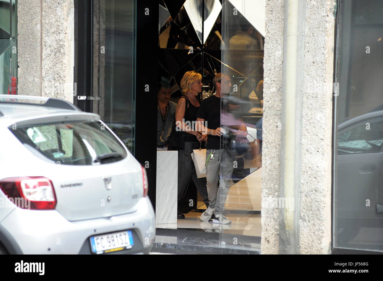 Milan, Paola Barale makes shopping in the center Paola Barale arrives ...