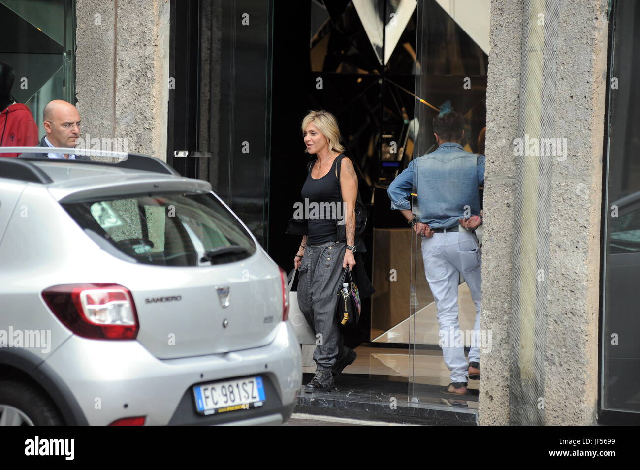 Milan, Paola Barale makes shopping in the center Paola Barale arrives ...