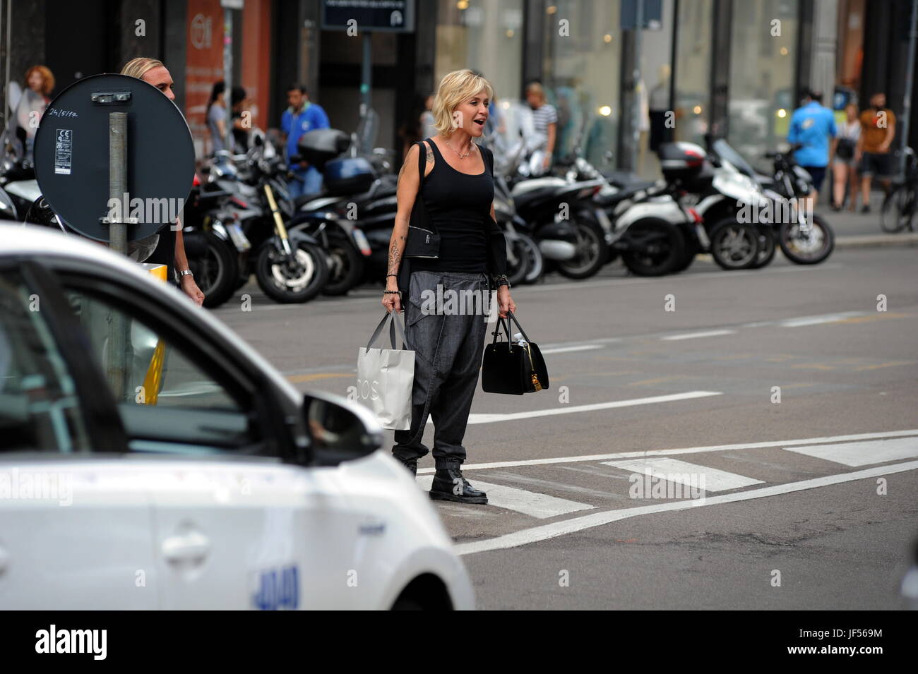 Milan, Paola Barale makes shopping in the center Paola Barale arrives ...