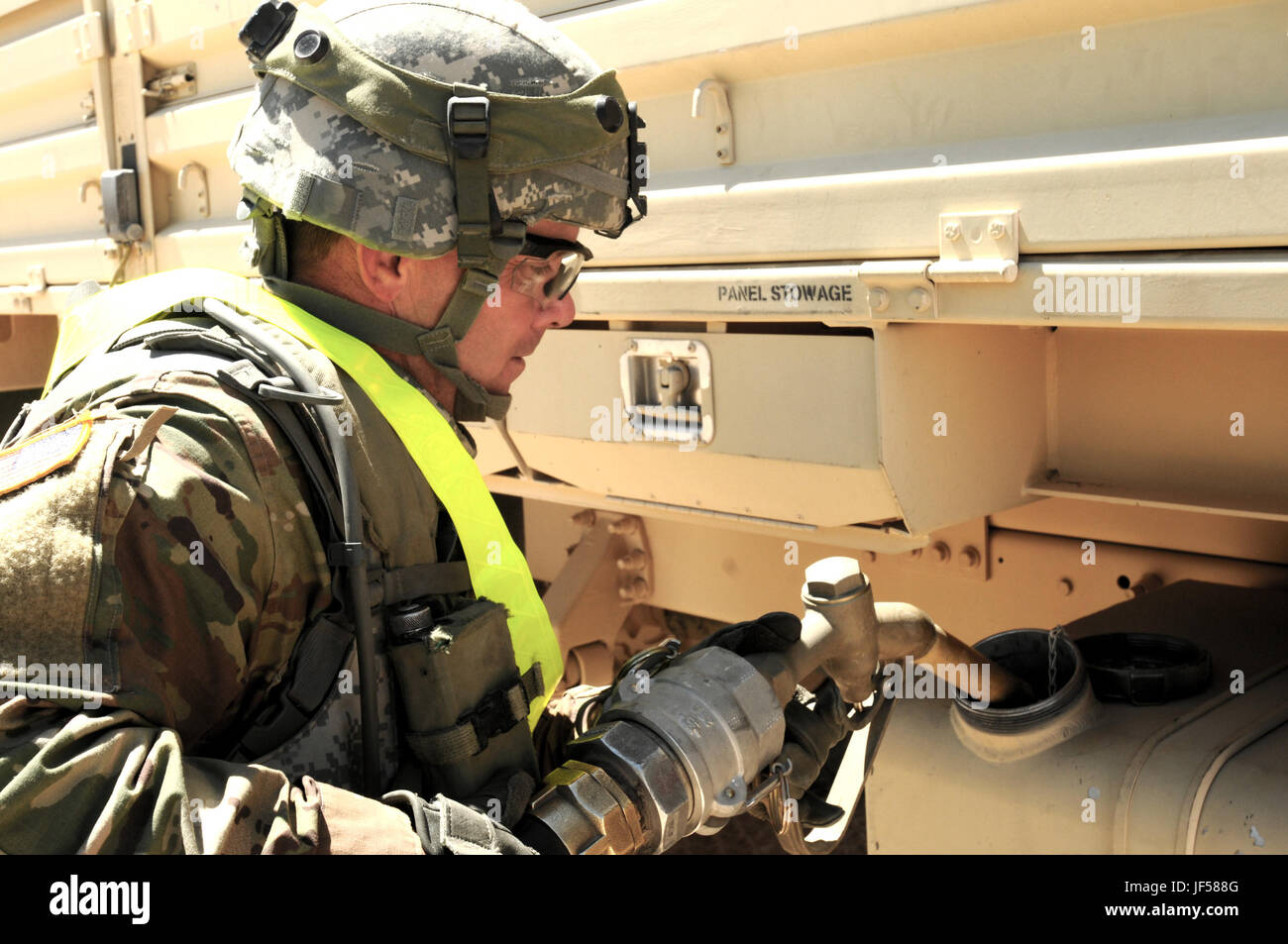 Spc. Mitchell Williamson of Company F, 106th Support Battalion fuels ...