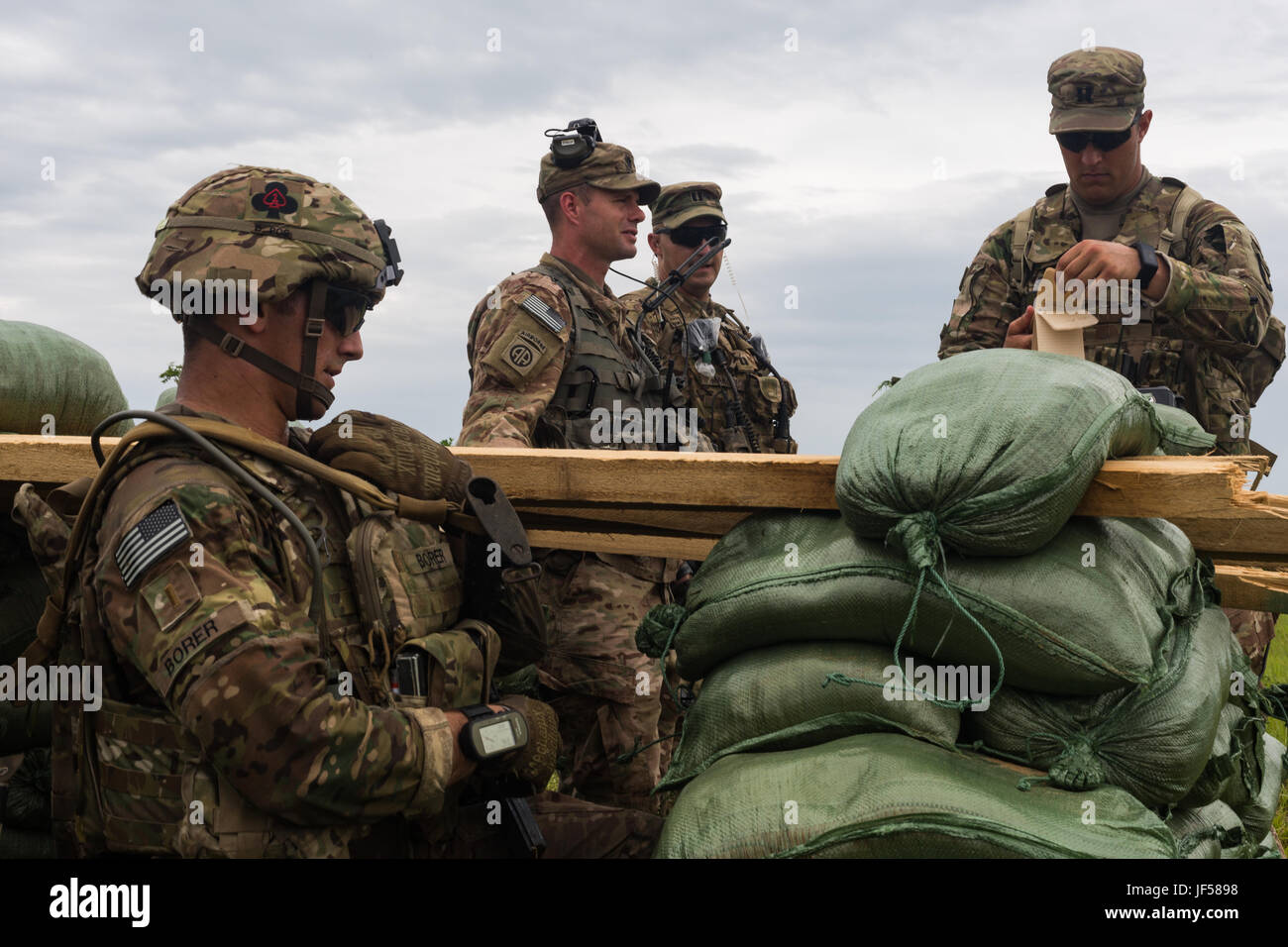 U.S. Army Lt. Col. Eugene Ferris, (center) commander of 1st Battalion ...