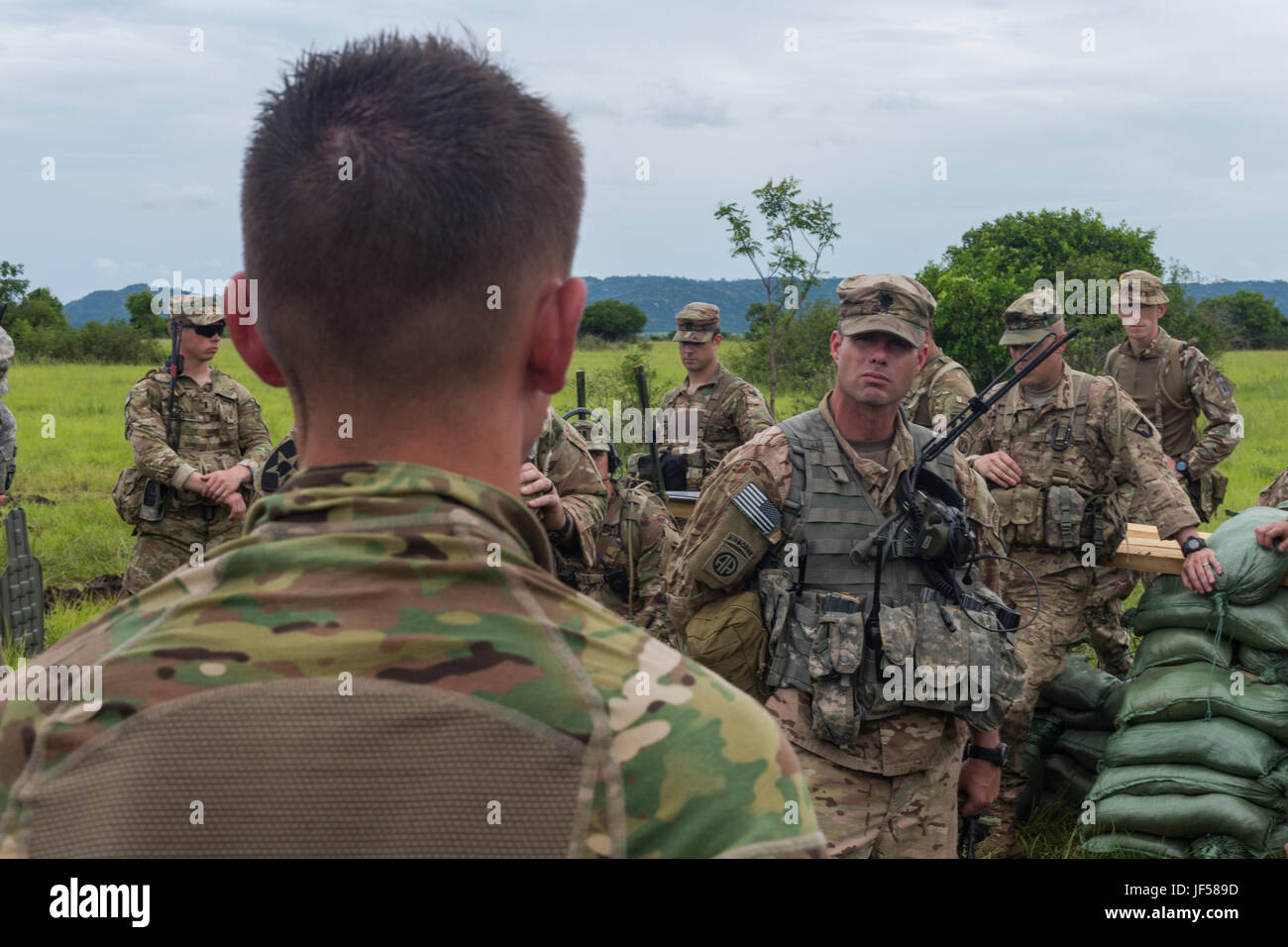 U.S. Army Lt. Col. Eugene Ferris, (center) commander of 1st Battalion ...