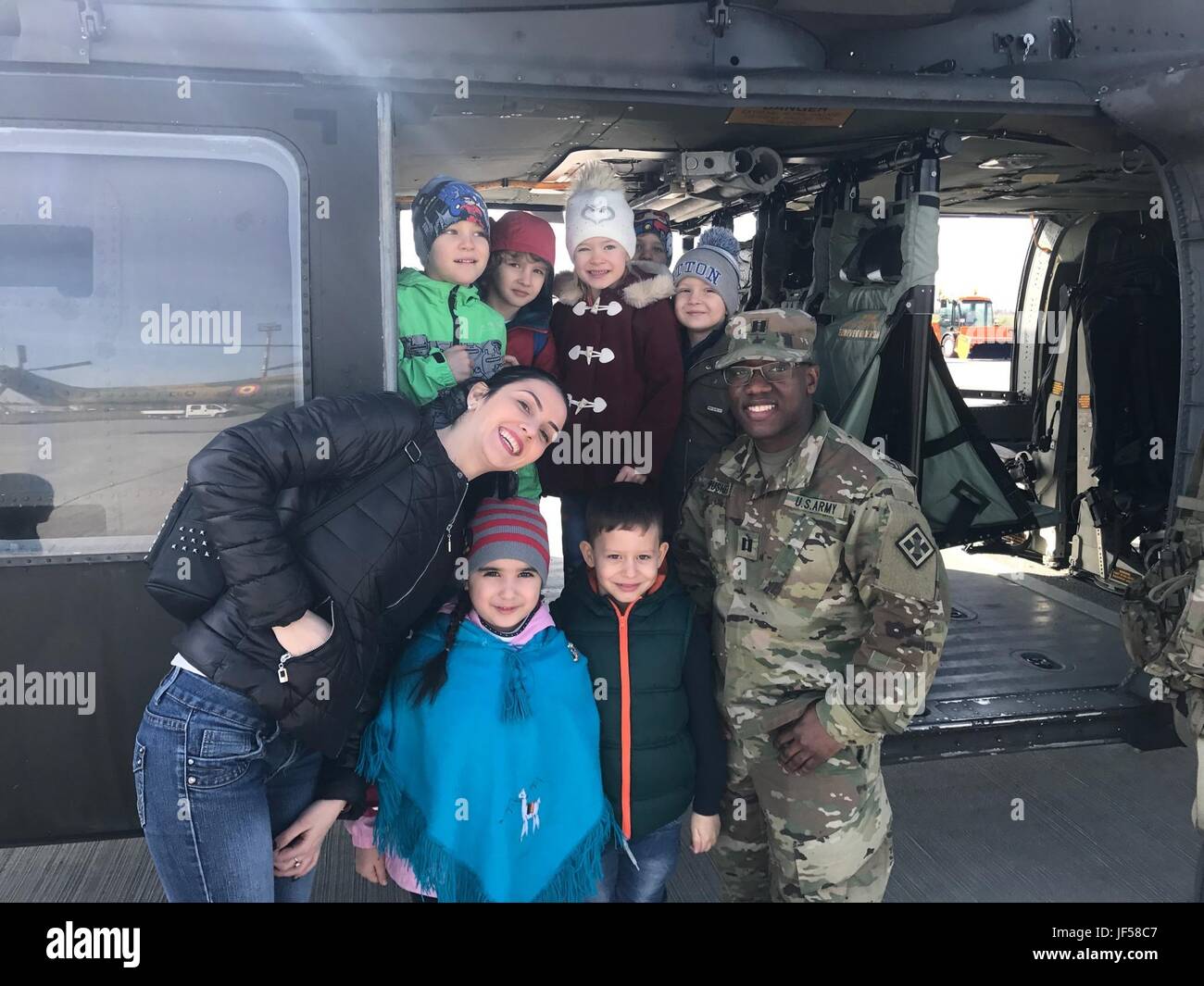 Capt. Jordan Rusher, a signal officer, 926th Engineer Brigade, poses ...