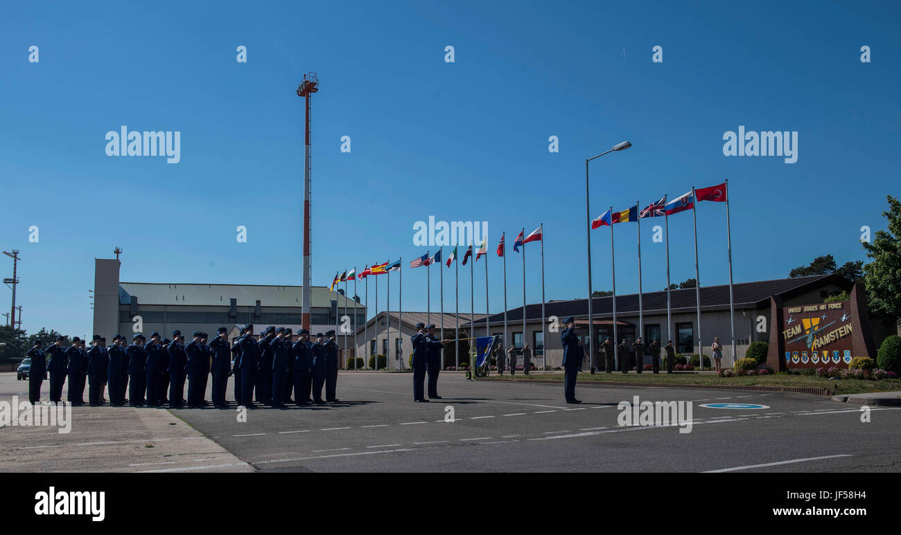 U.S. Air Force Airmen assigned to the 86th Operations Group salute ...
