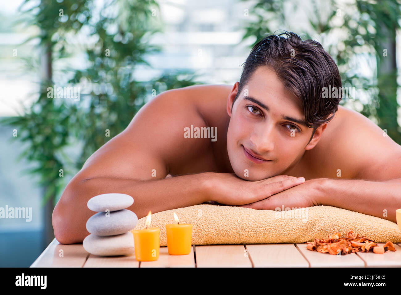 Handsome man during spa session Stock Photo - Alamy