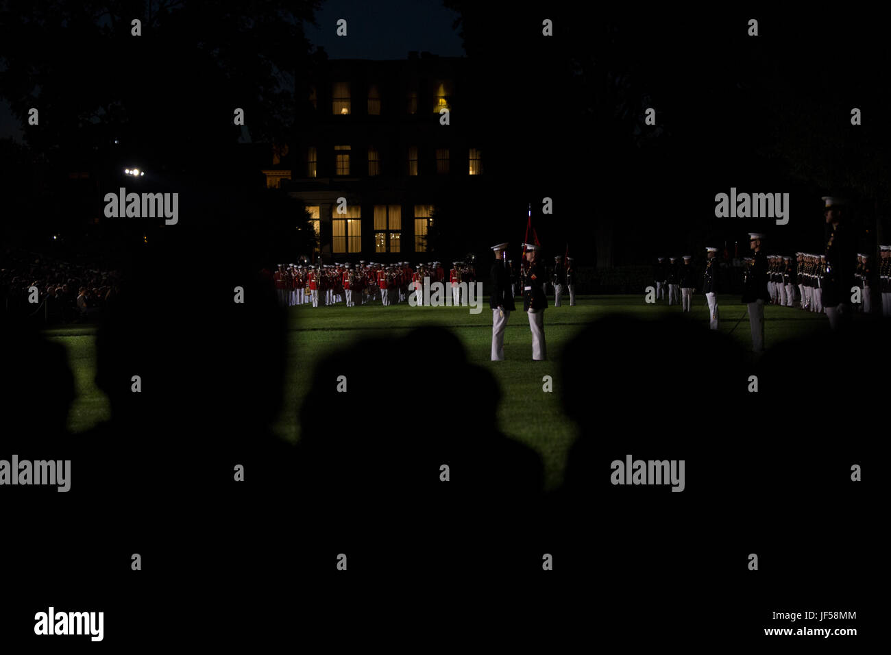 The Marine Corps Silent Drill Platoon performs during an evening parade ...